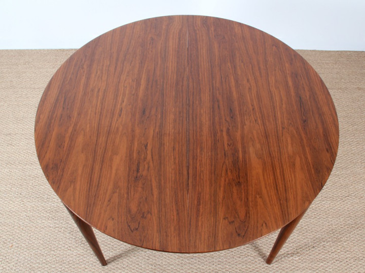 Scandinavian round table in Rio rosewood 4/8 seats. | Galerie Møbler