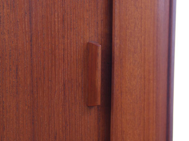 Angle bar cabinet with tambour doors
